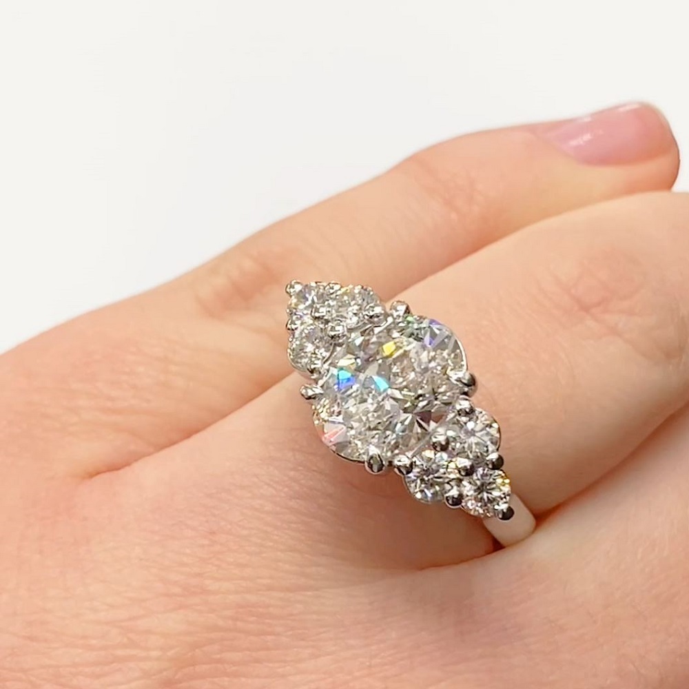 Oval diamond cluster with upswept rail ring - Holloway Diamonds